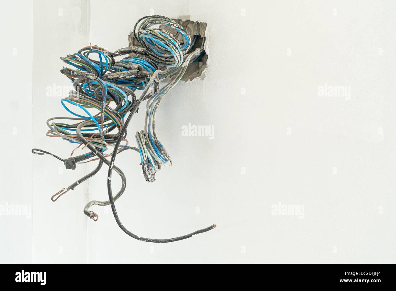 Electrical box and power wires in concrete wall Stock Photo - Alamy