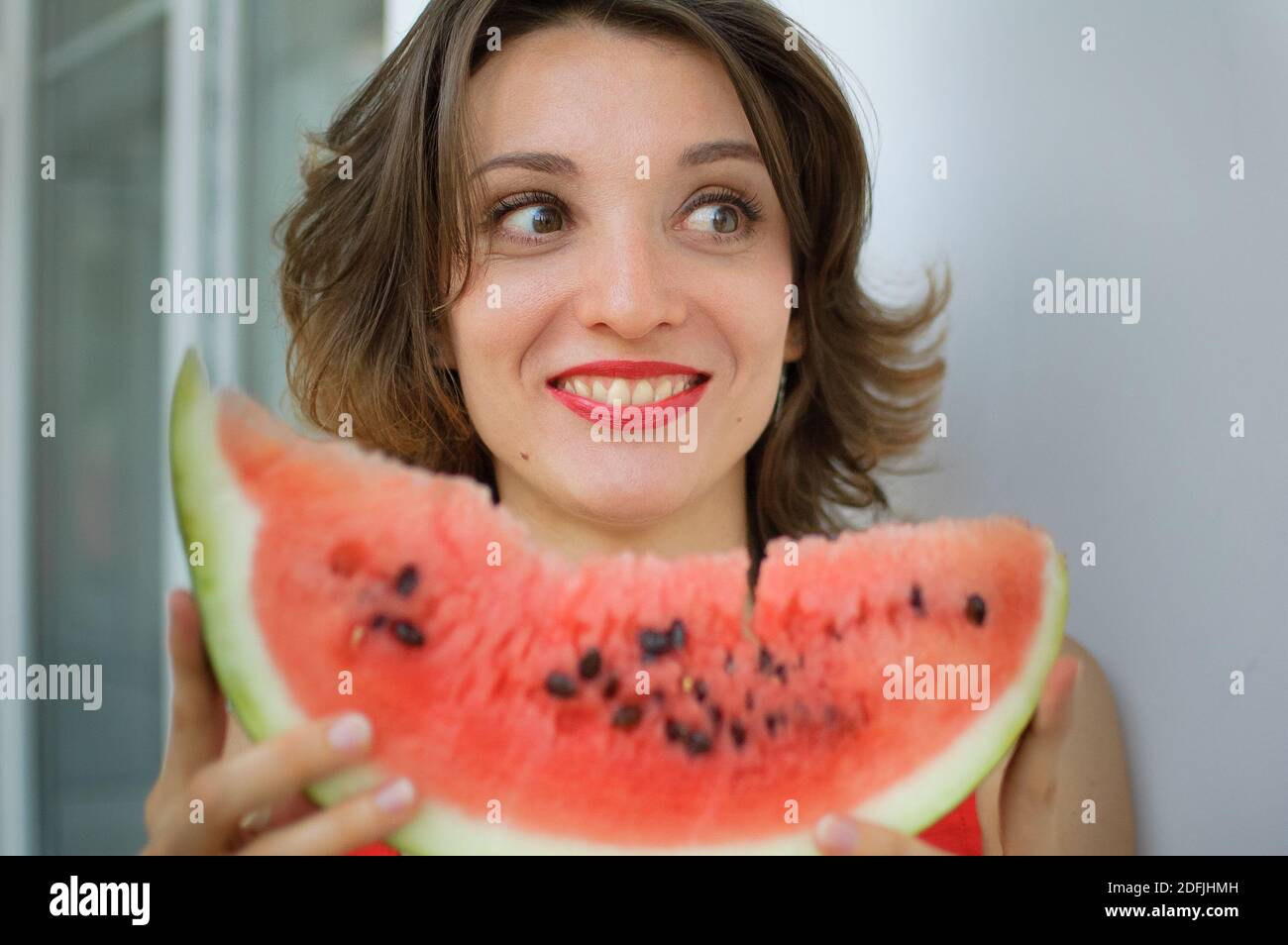 Close up indoors portrait of beautiful woman with short hair and ...