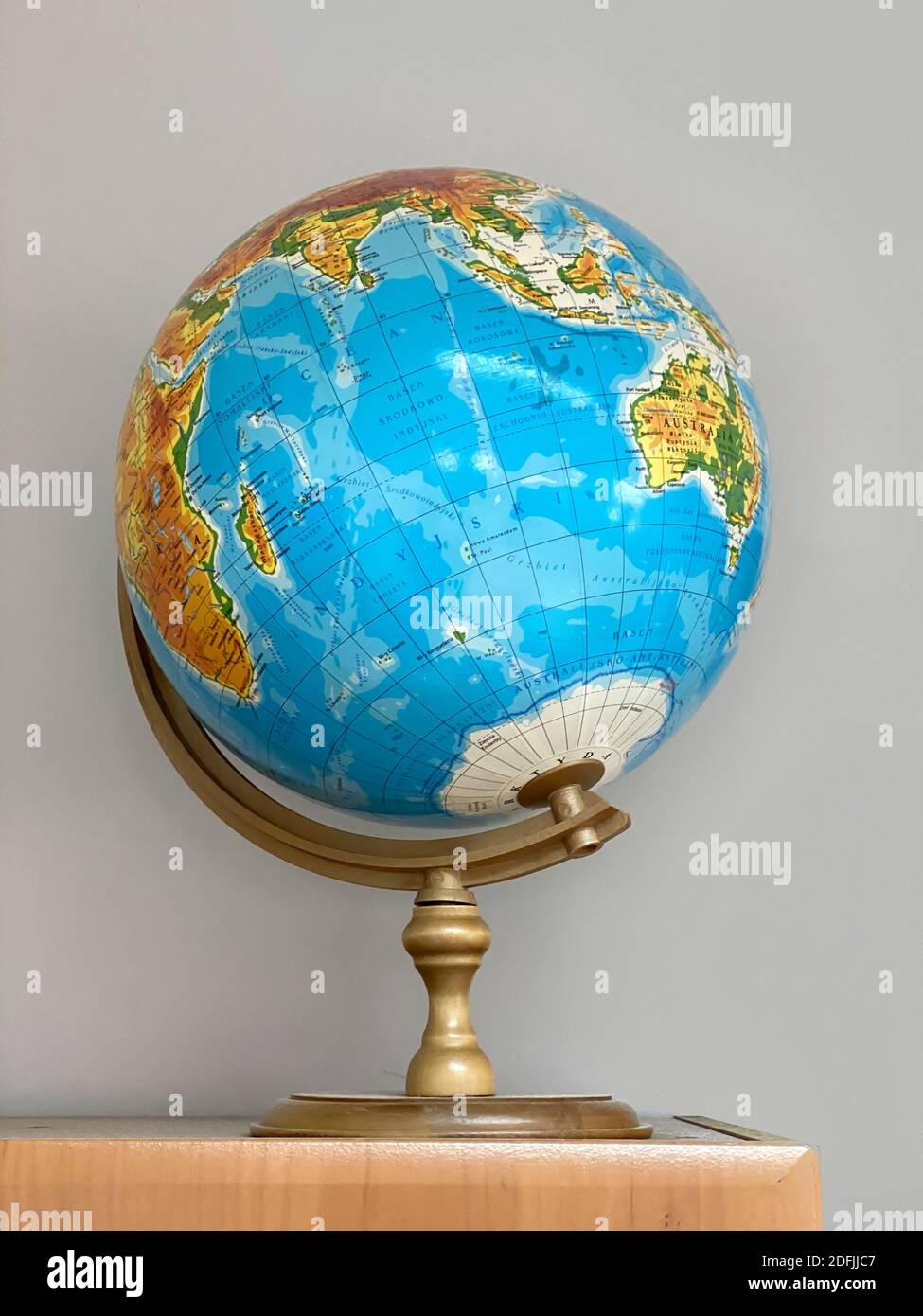 the globe is on a wooden shelf Stock Photo - Alamy