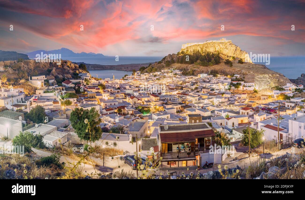 Landscape with Lindos village and castle at twilight time in Rhodes ...