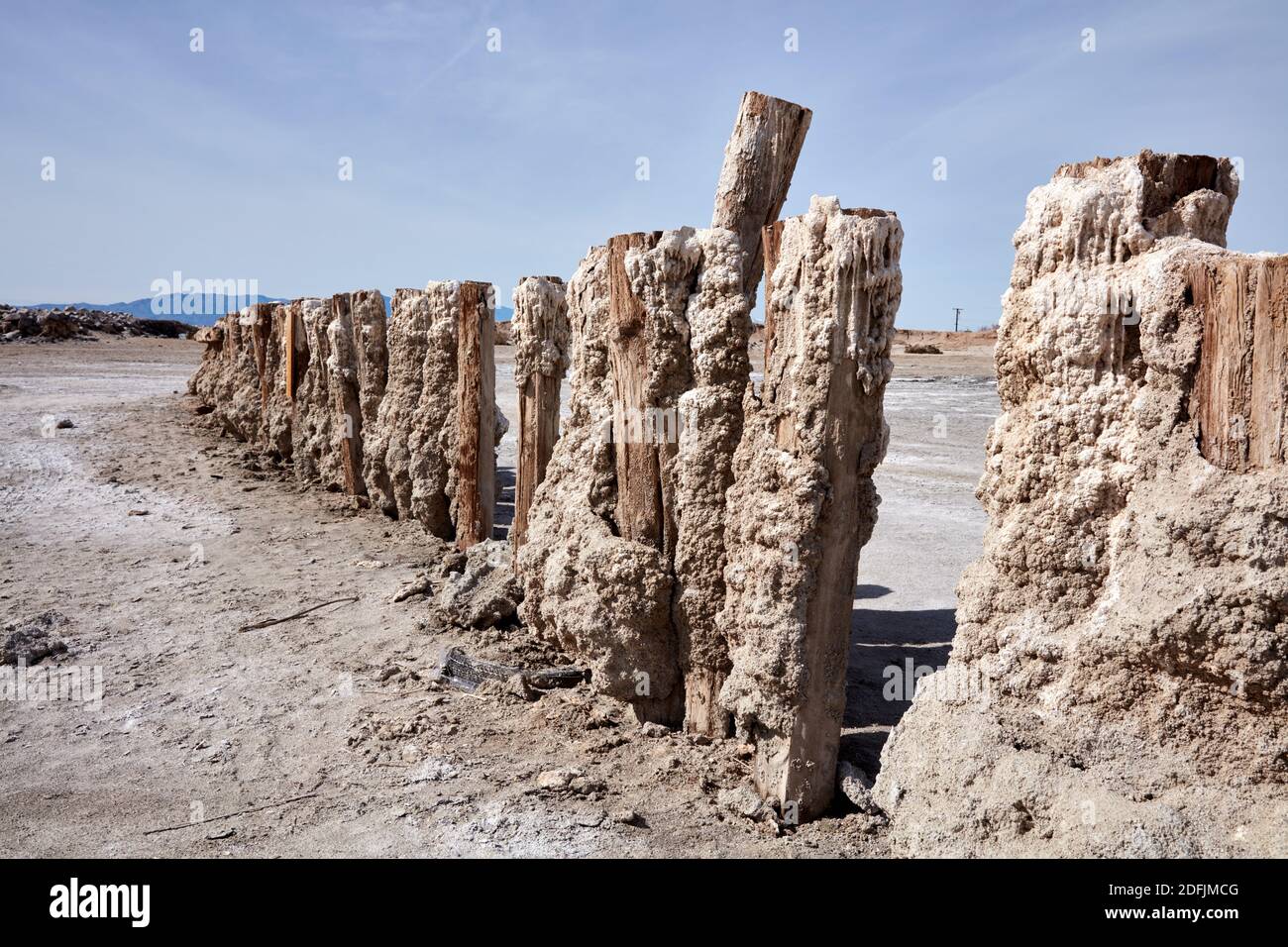 Salt encrusted pilings at Salton Sea left behind as the lake continues ...