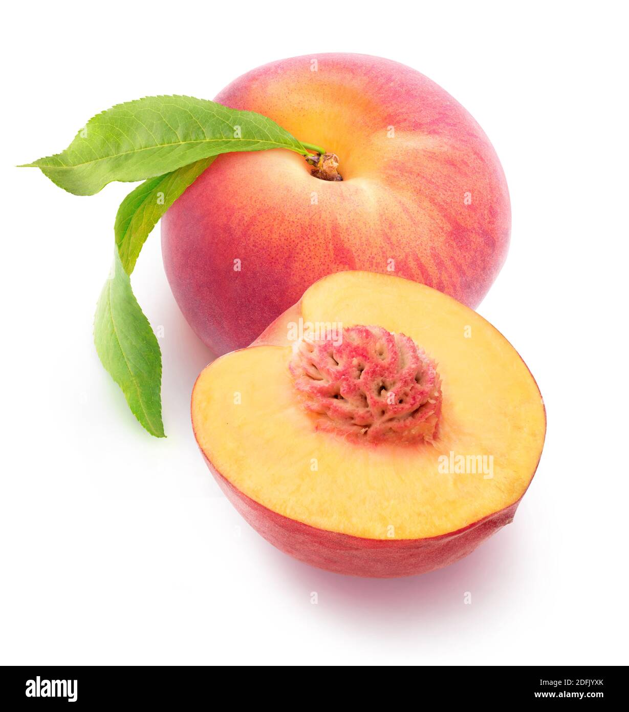 One whole peach and a half with stone isolated on white background, top ...