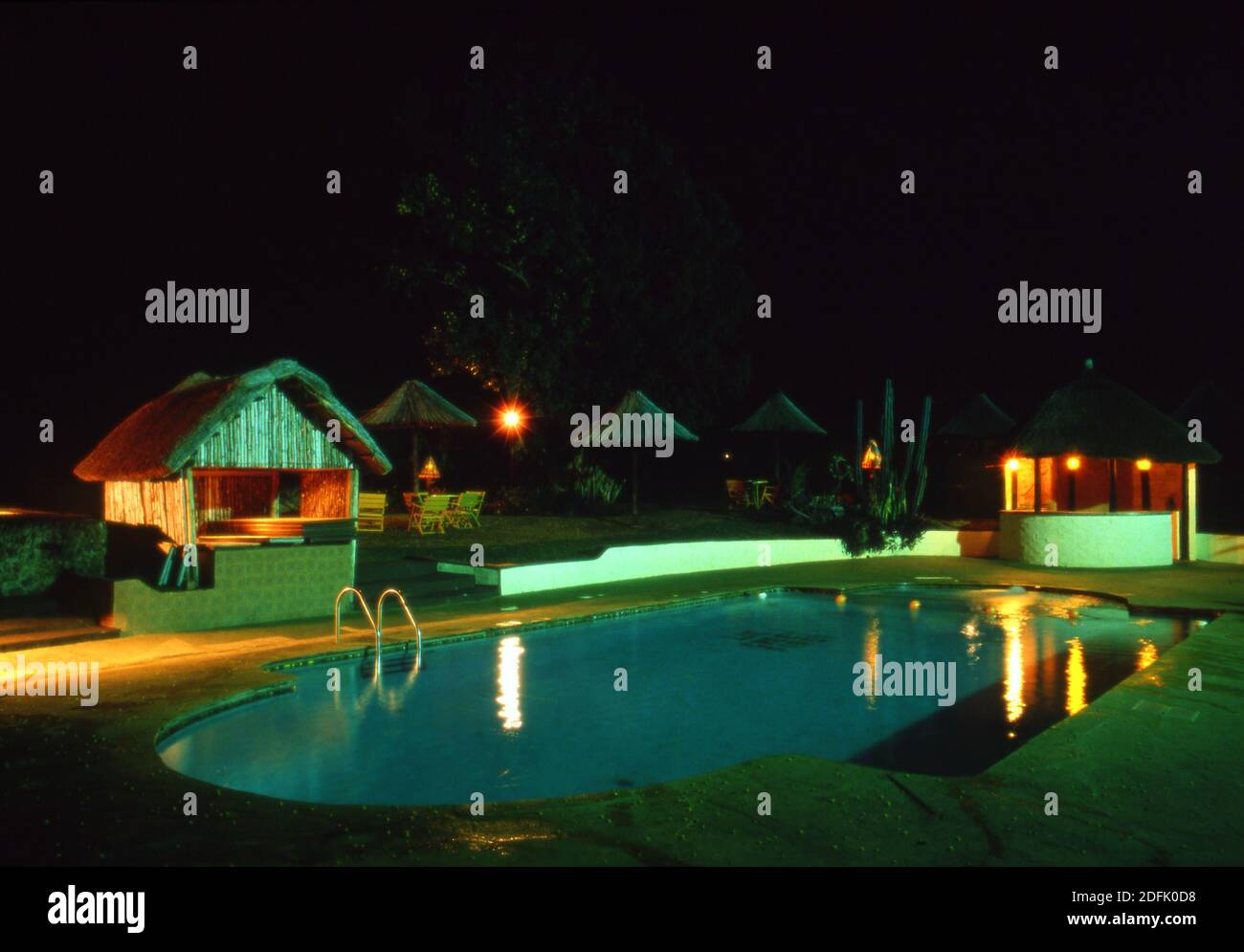 Swimming pool at overnight rest camp, night time, South Africa 1981 ...