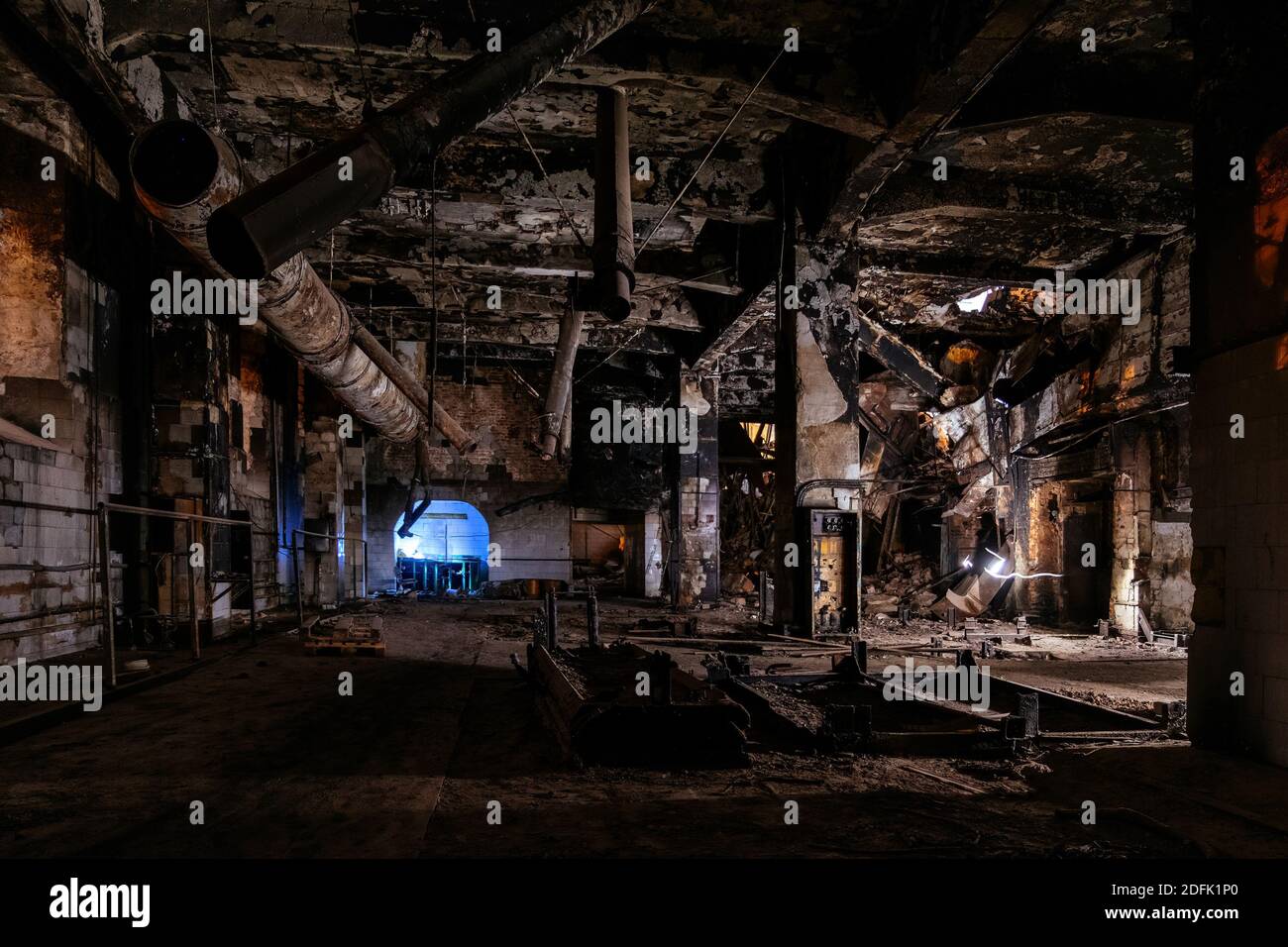 Burnt and ruined interior of industrial building after fire ...