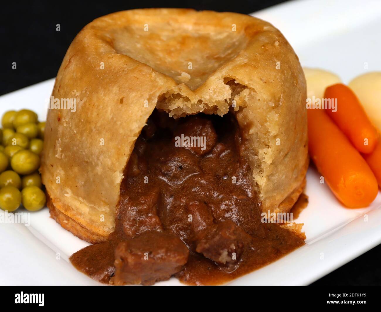 Suet pudding carrots peas hi-res stock photography and images - Alamy