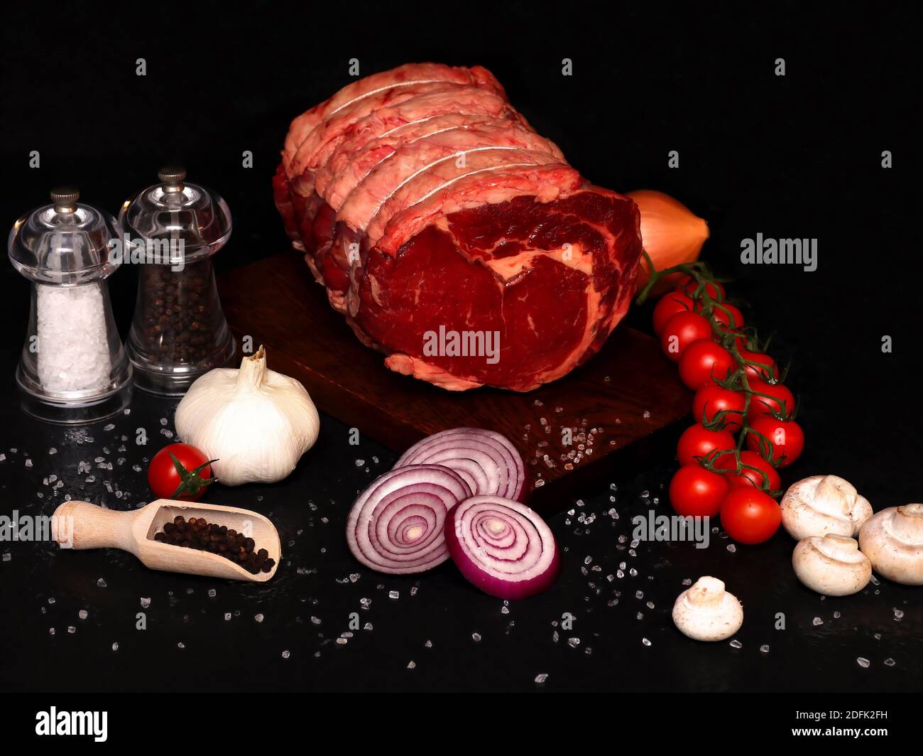 Rolled rib of beef bones hi-res stock photography and images - Alamy