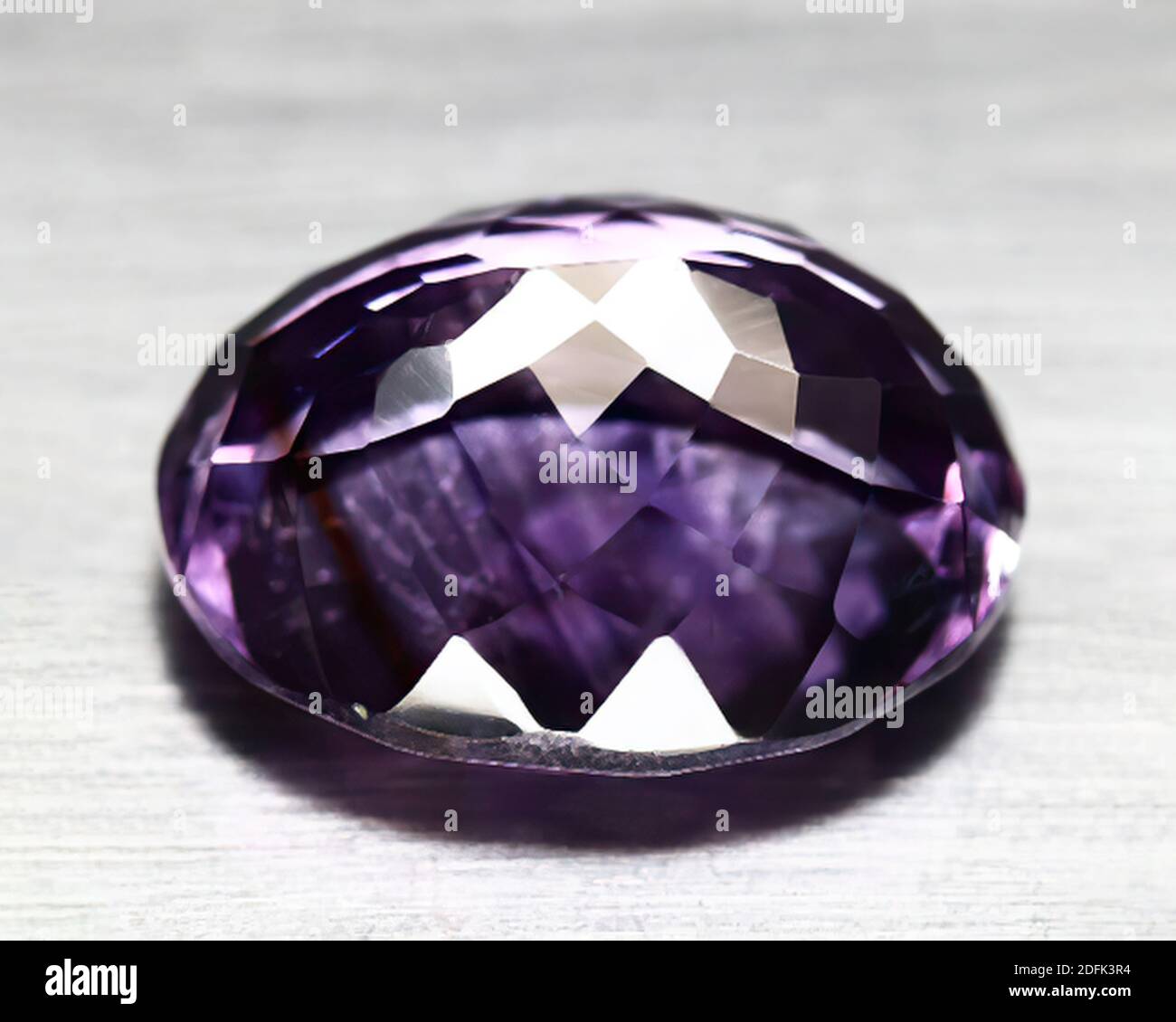 Natural amethyst on white background Stock Photo - Alamy