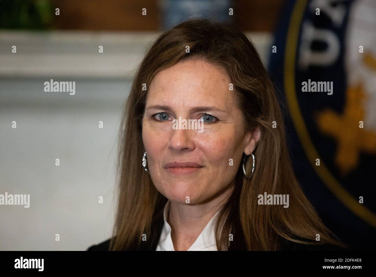 US Supreme Court nominee Amy Coney Barrett looks on as she meets with ...