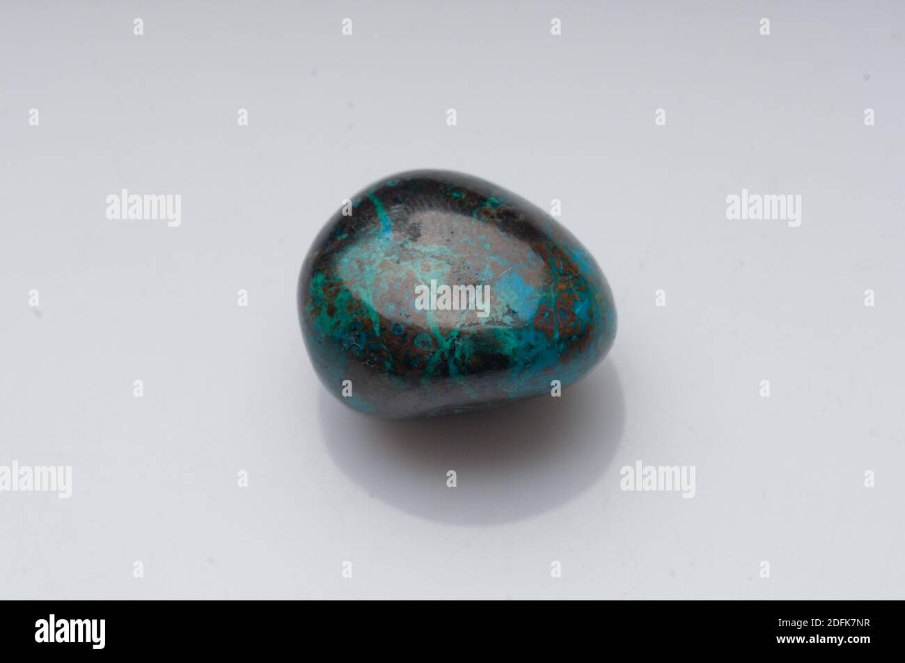 Natural chrysocolla stone on white background Stock Photo - Alamy
