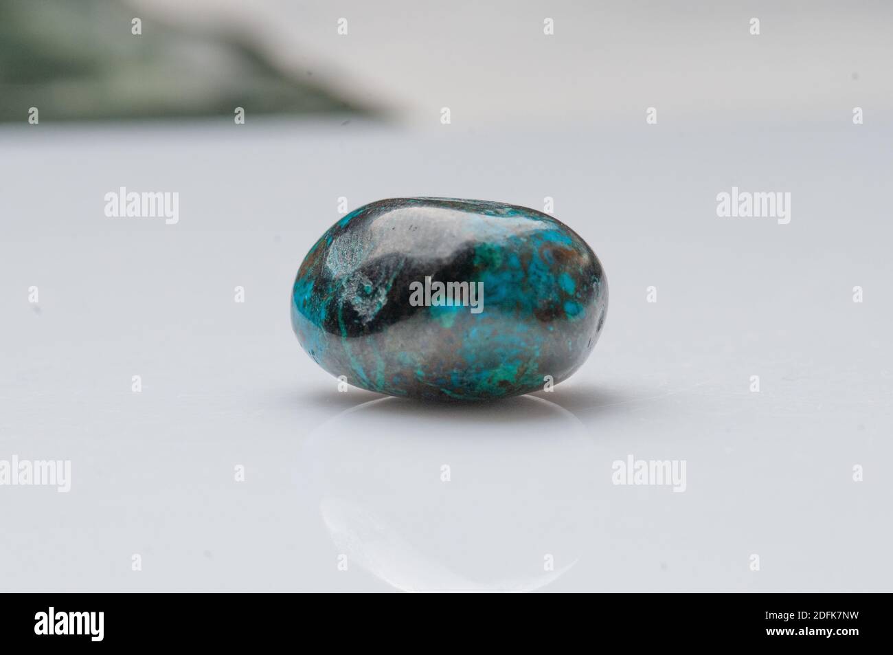 Natural chrysocolla stone on white background Stock Photo - Alamy