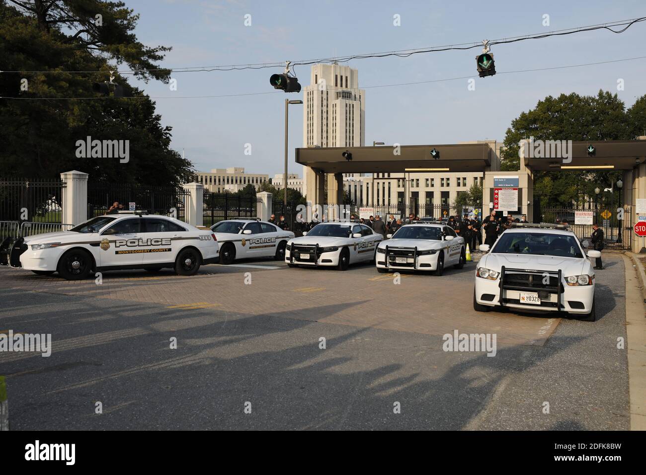 Police cars block the entrance of Walter Reed Medical Center during U.S ...