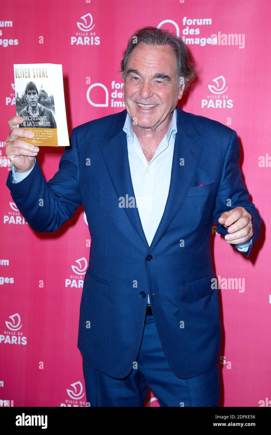 Oliver Stone attending a photocall for the launching of his book ...