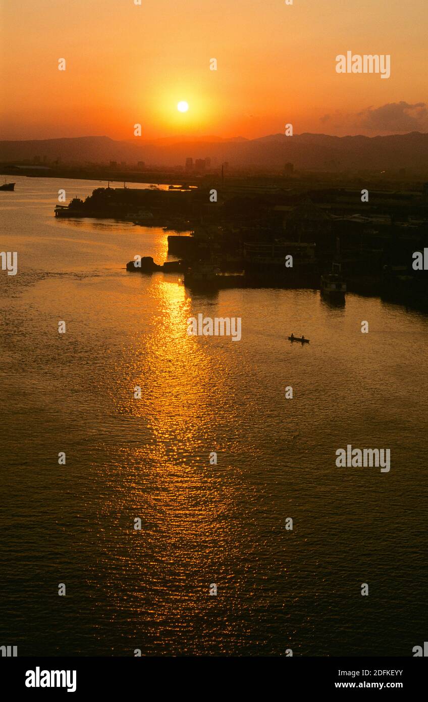 The Mactan Channel in Cebu City, the Philippines, at sunset Stock Photo ...