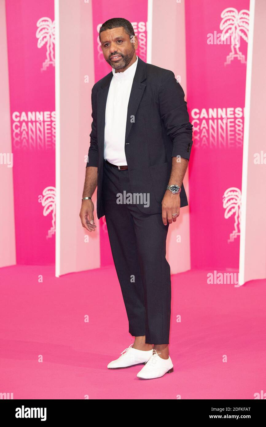 Youssef Hajdi poses on the pink carpet prior to the opening ceremony of ...
