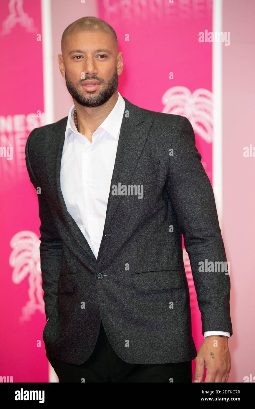 Xavier Delarue arrives on the pink carpet for the screening of Les ...