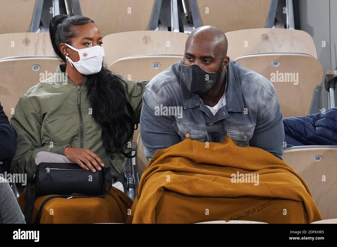 Teddy Riner and his wife Luthna Plocus attend the French Open at Roland ...