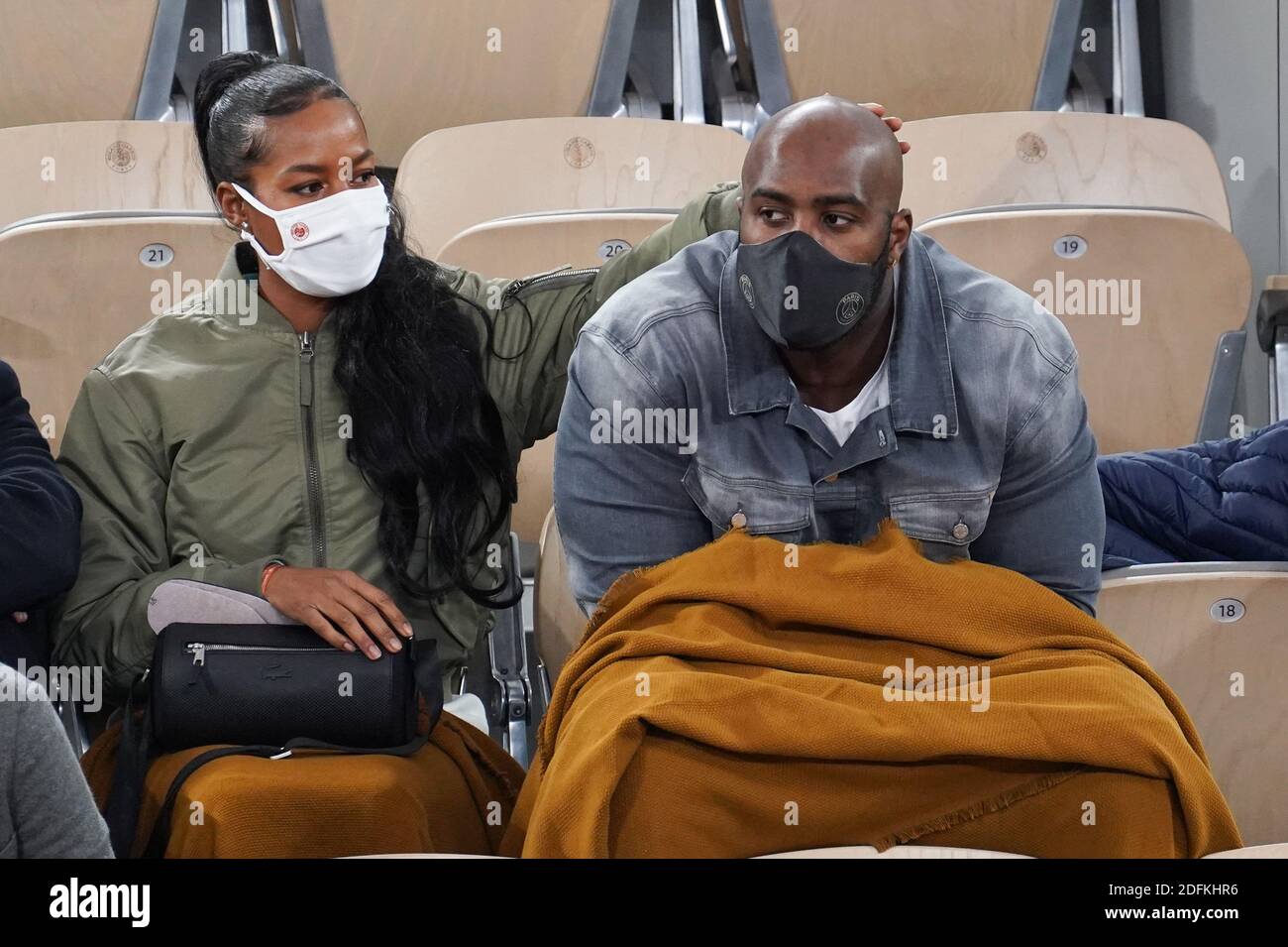 Teddy Riner and his wife Luthna Plocus attend the French Open at Roland ...