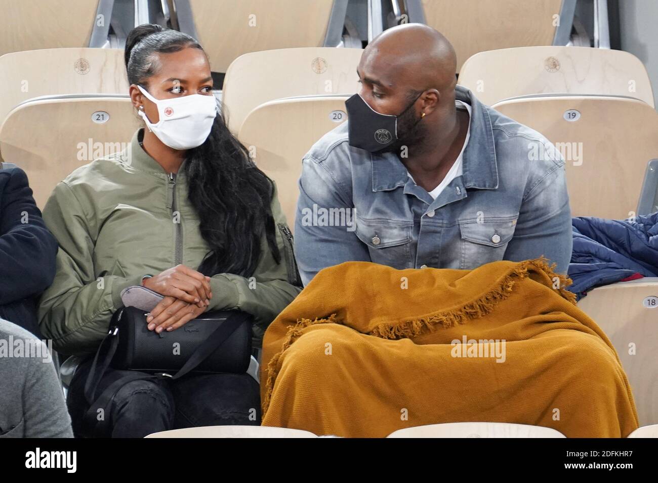 Teddy Riner and his wife Luthna Plocus attend the French Open at Roland ...