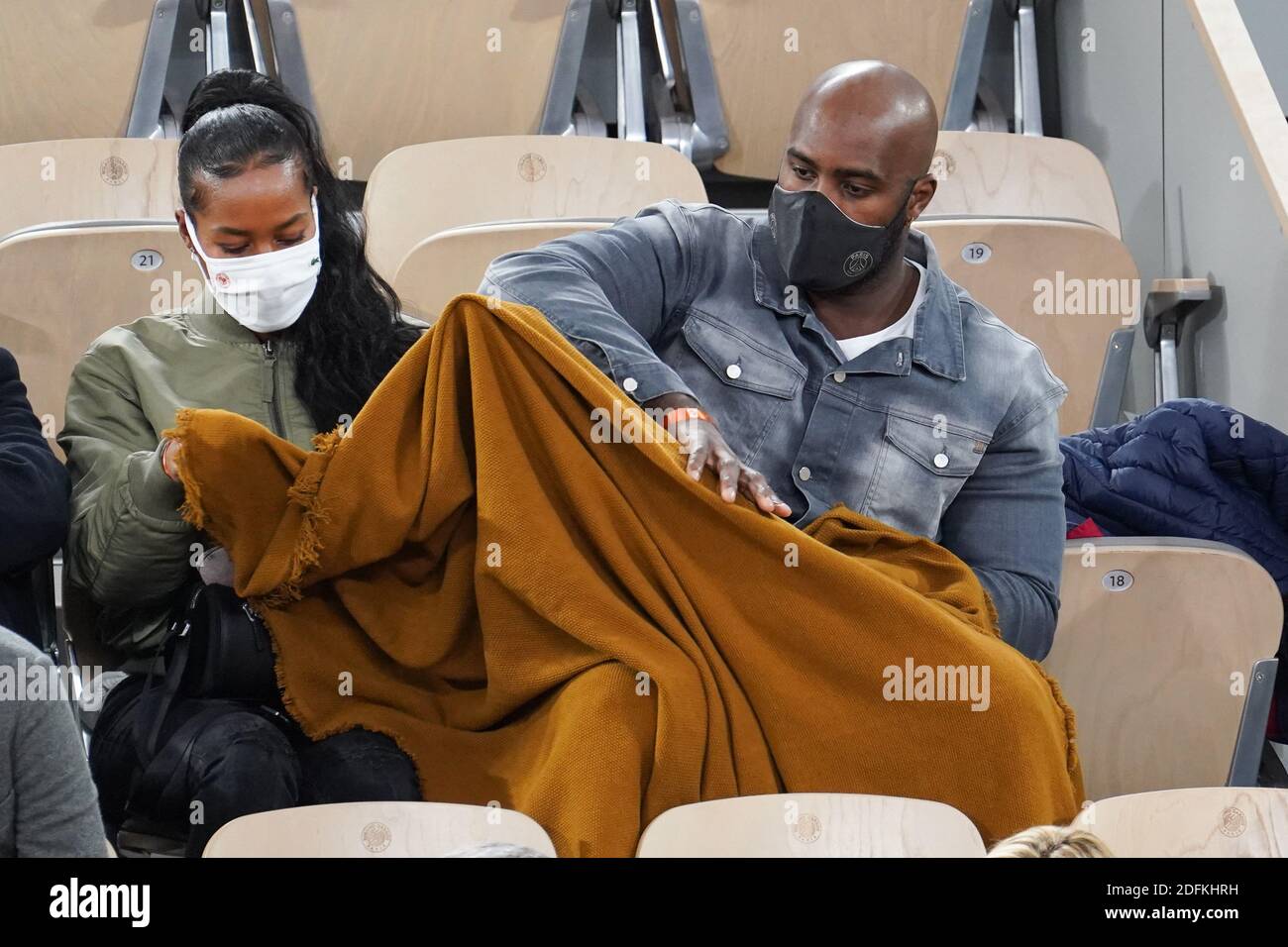 Teddy Riner and his wife Luthna Plocus attend the French Open at Roland ...