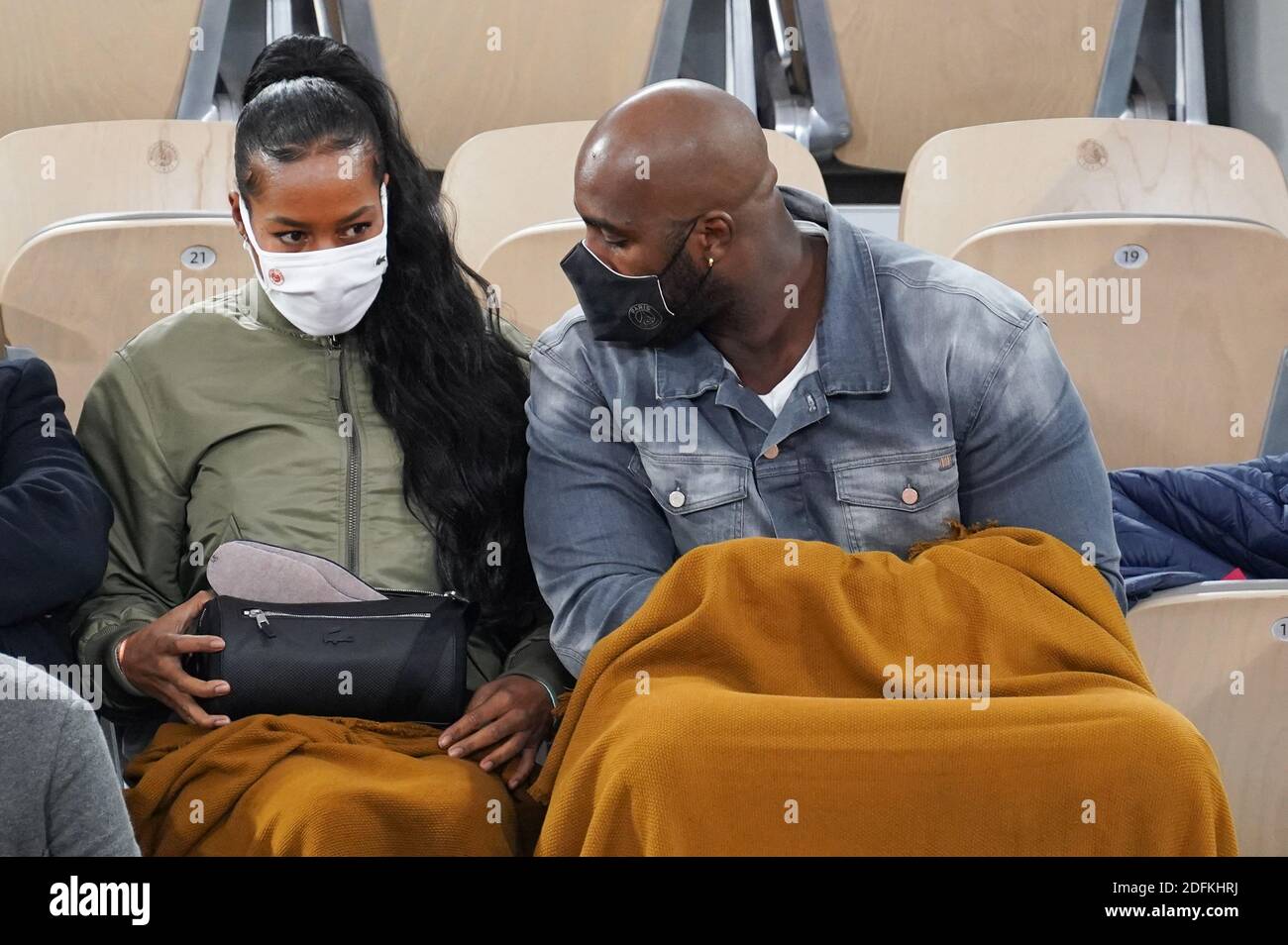 Teddy Riner and his wife Luthna Plocus attend the French Open at Roland ...