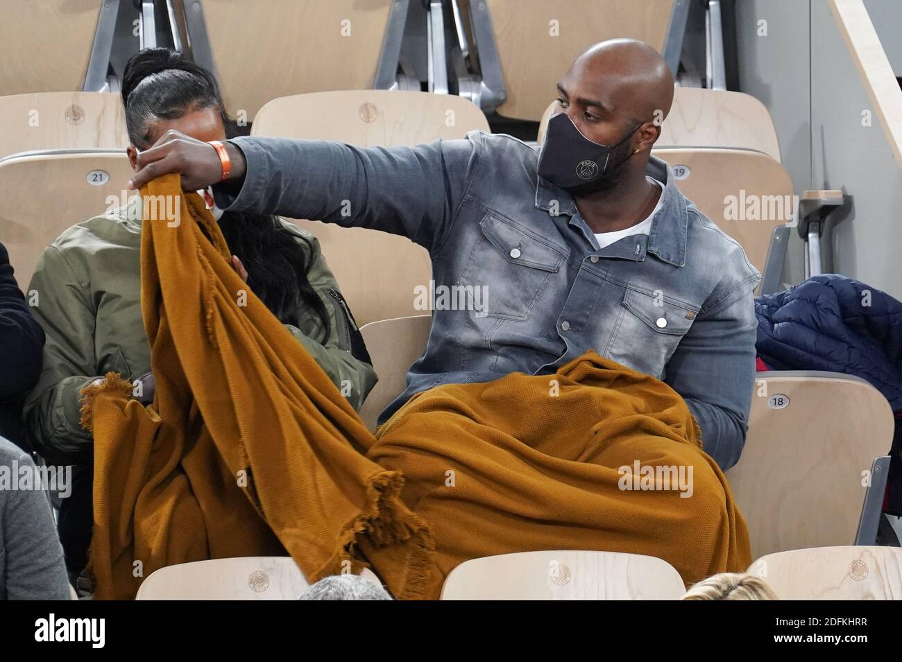 Teddy Riner and his wife Luthna Plocus attend the French Open at Roland ...