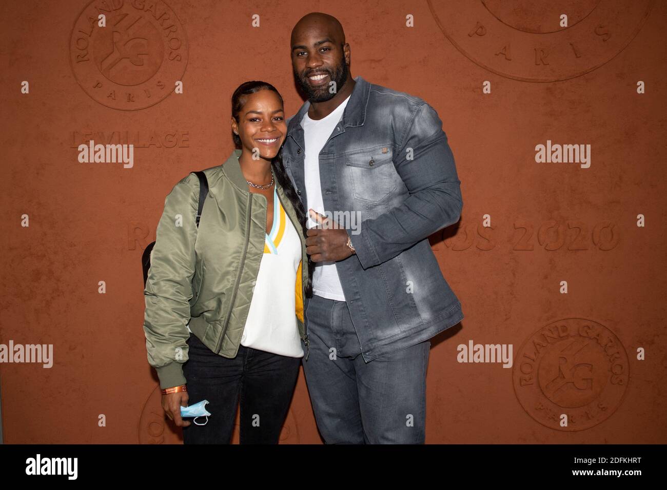 Teddy Riner and his wife Luthna Plocus attend the French Open at Roland ...