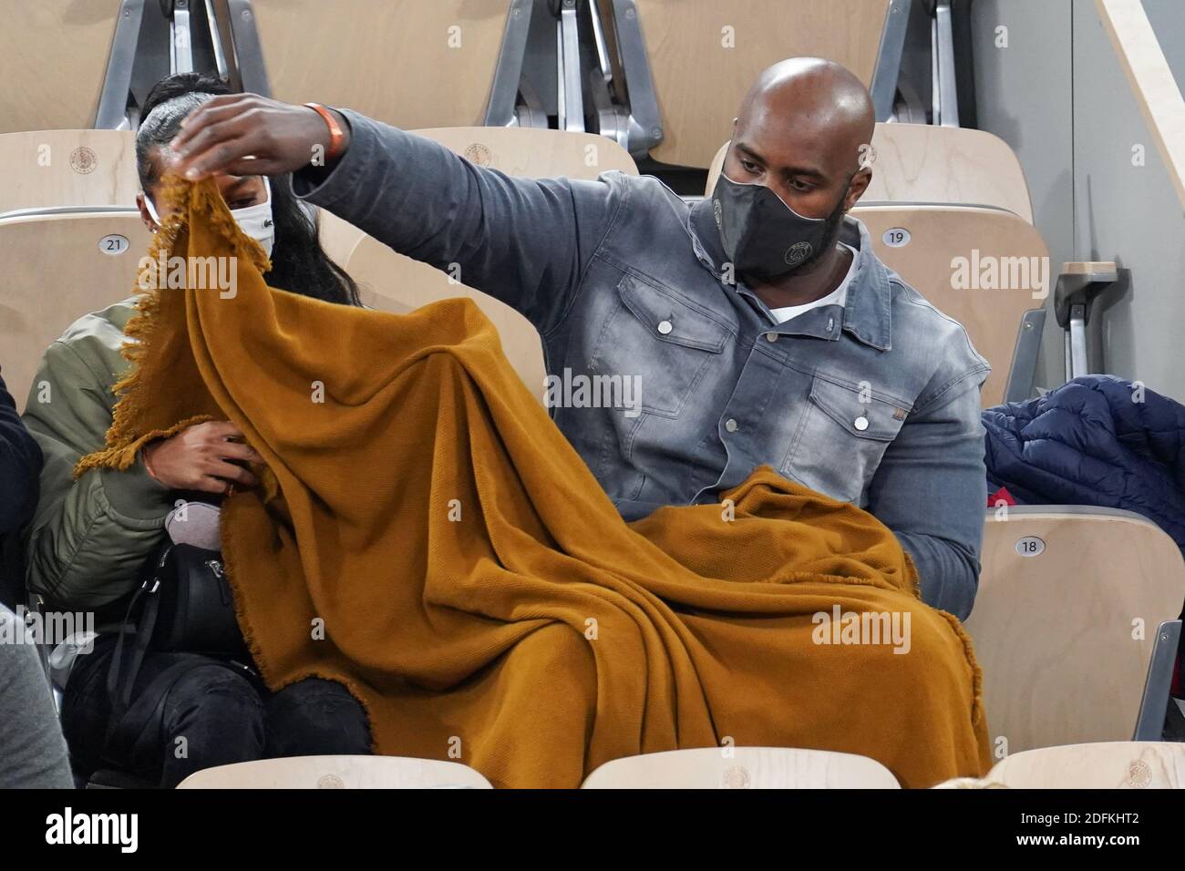 Teddy Riner and his wife Luthna Plocus attend the French Open at Roland ...