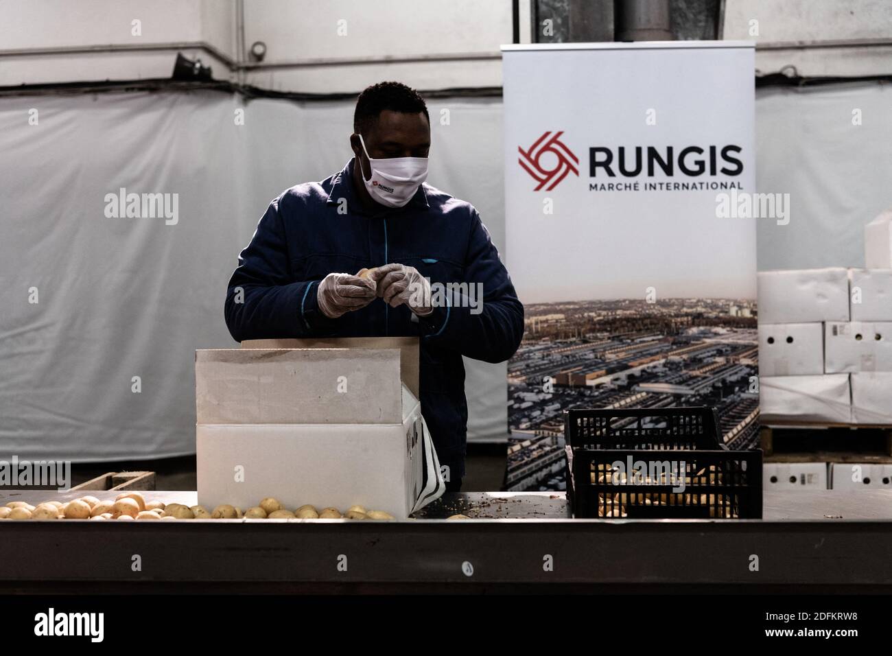 People working at the MIN of Rungis (Marche International). Rungis ...