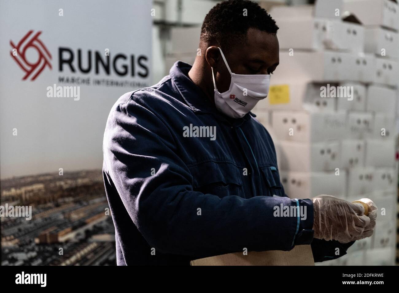 People working at the MIN of Rungis (Marche International). Rungis ...