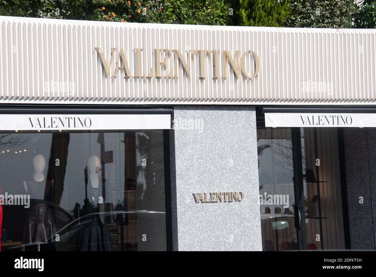 A shop sign of VALENTINO, on October 13, 2020 in Cannes, France. Photo ...