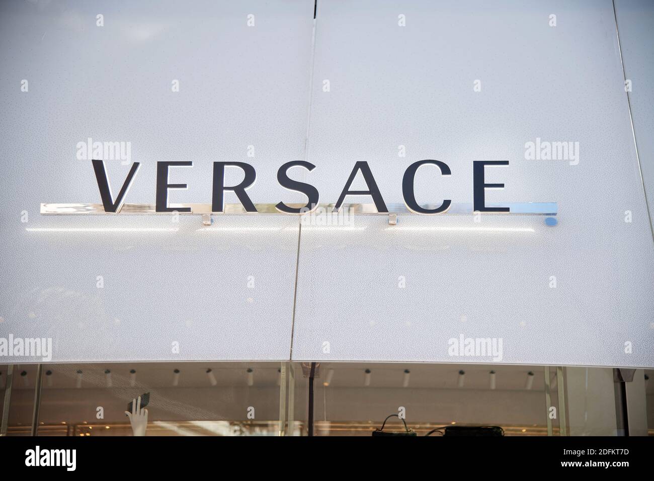 A shop sign of VERSACE, on October 13, 2020 in Cannes, France. Photo by ...