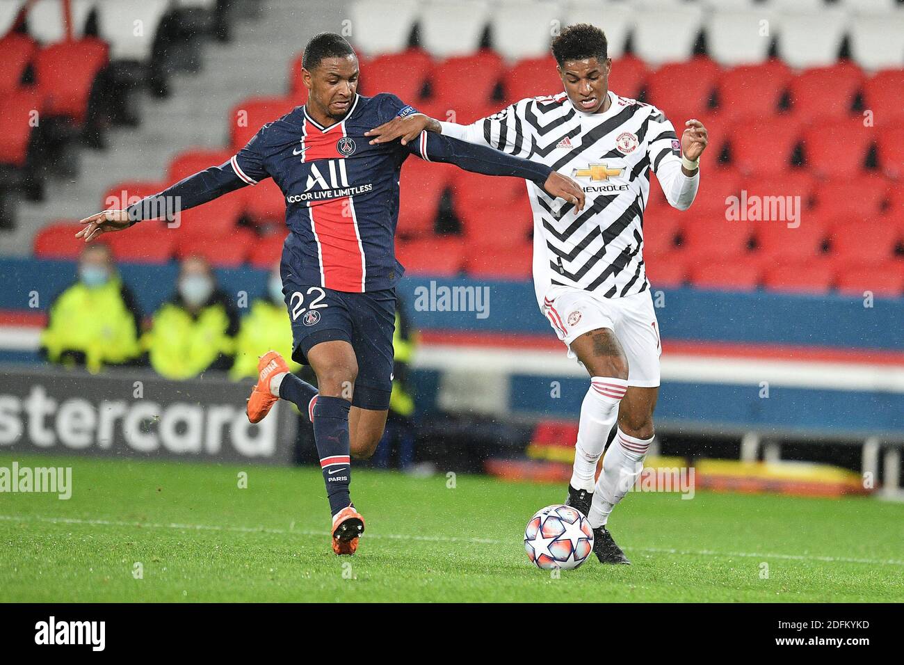 Abdou Diallo of Paris Saint Germain and Marcus Rashford of Manchester ...