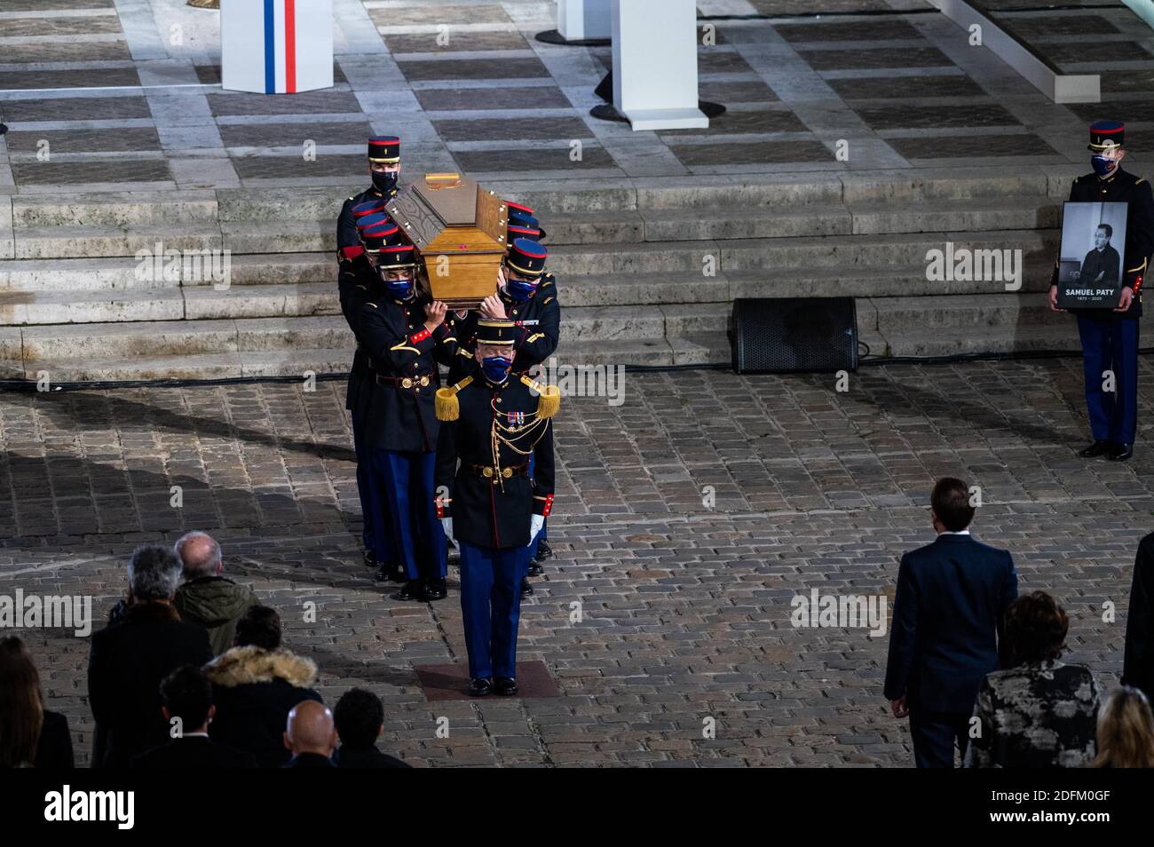 French Republican guards carry Samuel Paty's coffin inside Sorbonne ...