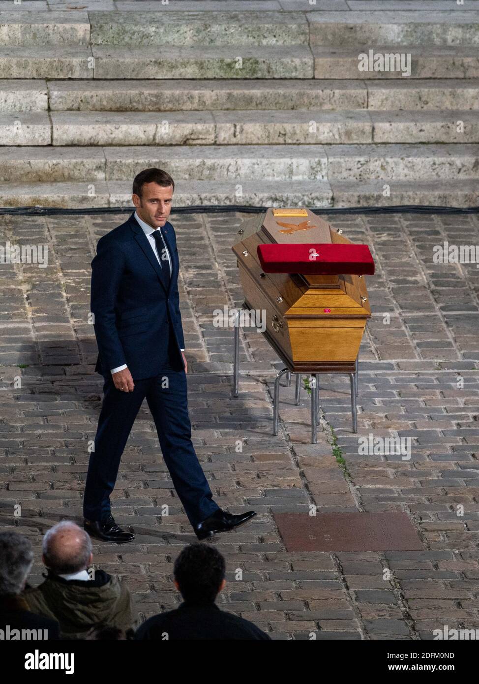 French President Emmanuel Macron stands in front of Samuel Paty's ...
