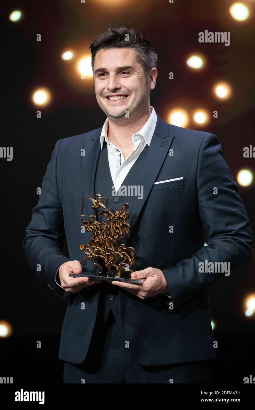 Pierre Etienne Leonard poses with the Discovery award during the ...