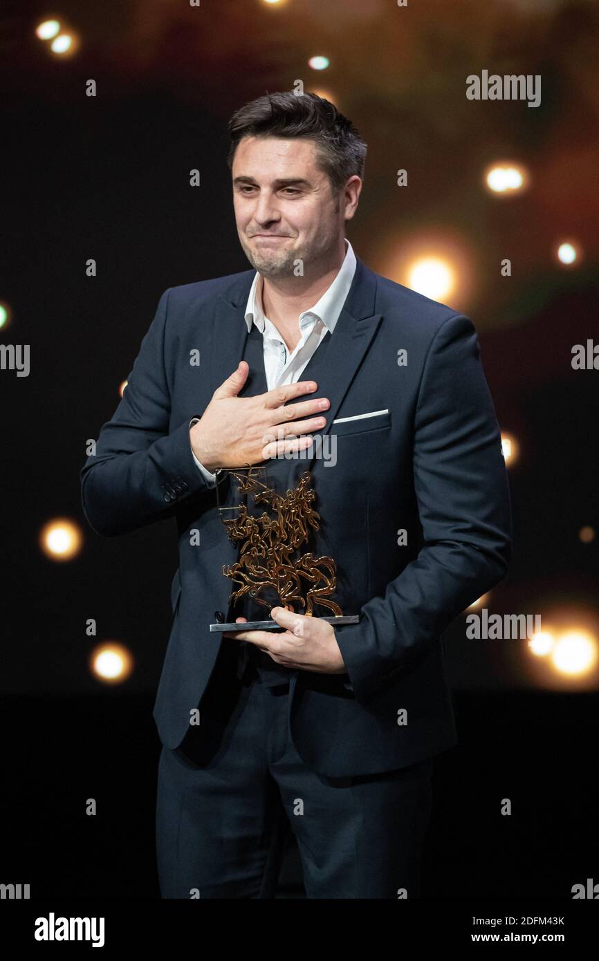 Pierre Etienne Leonard poses with the Discovery award during the ...