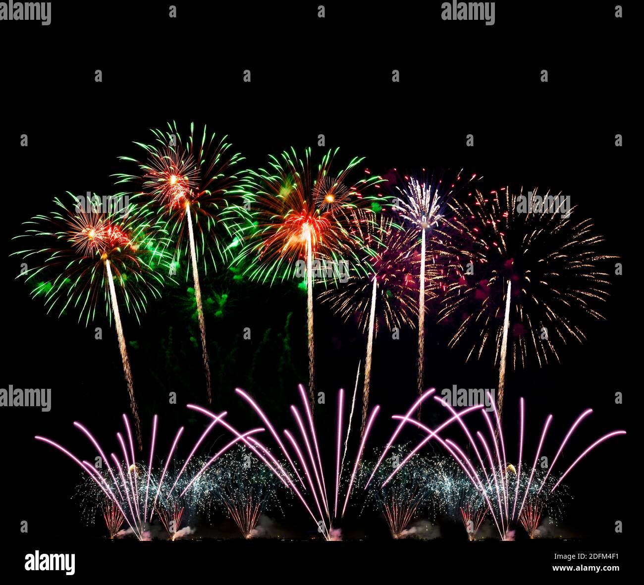 Colorful fireworks of various colors over night sky Stock Photo - Alamy