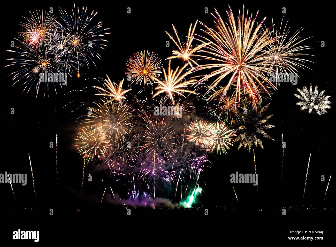 Colorful fireworks over night sky Stock Photo - Alamy