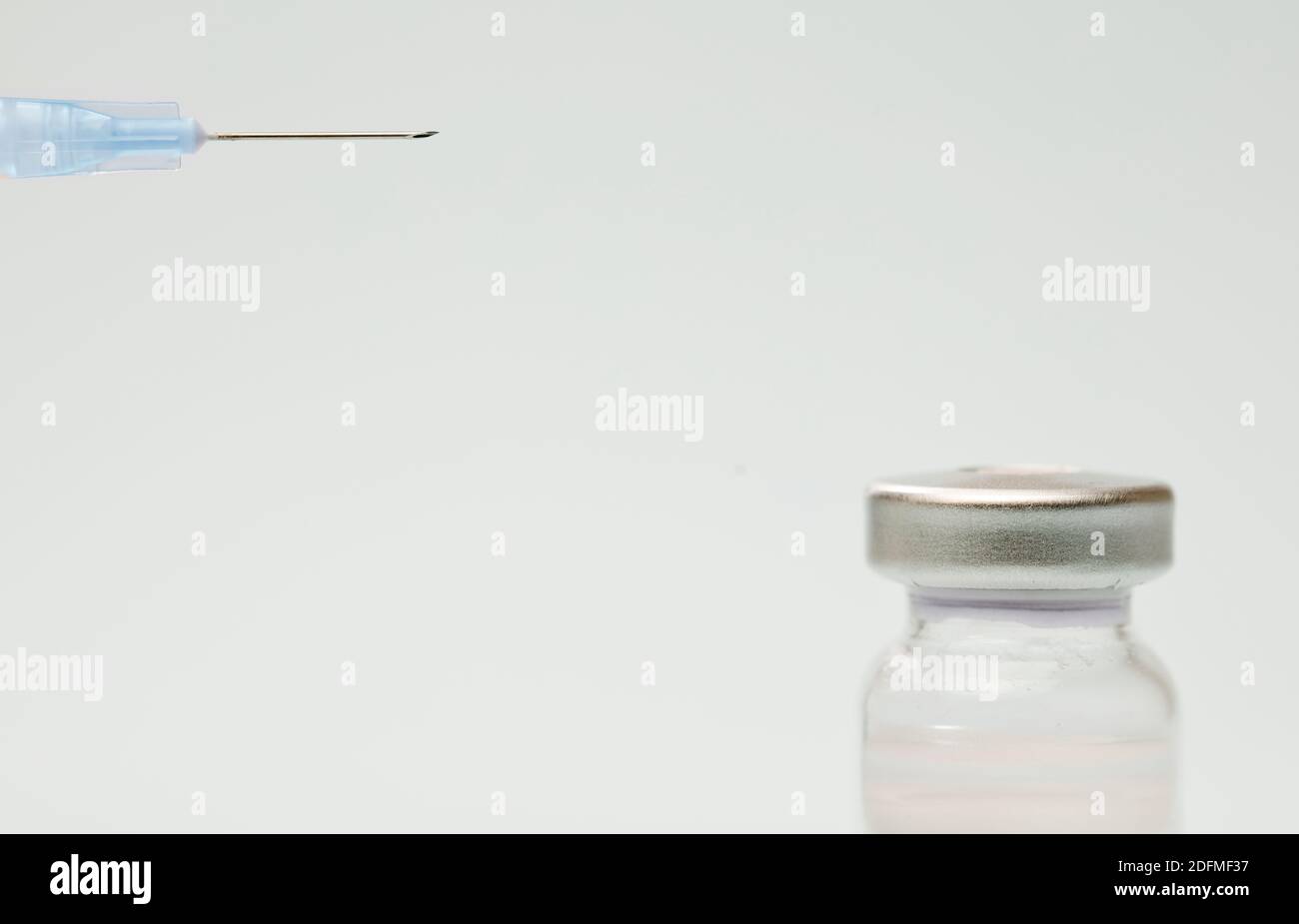 blue cannula syringe with vaccine in vial,white background Stock Photo ...