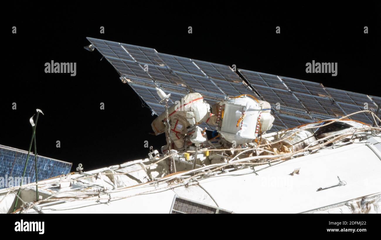 Handout photo dated November 18, 2020 of (From left) Expedition 64 ...