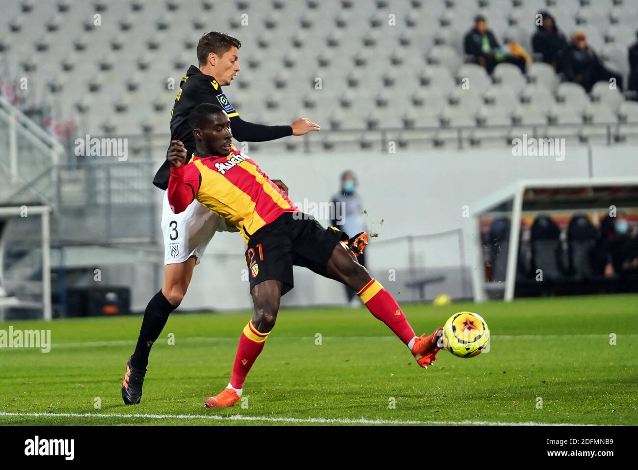 Andrei Girotto of FC Nantes and Massadio Haidara of RC Lens during the ...