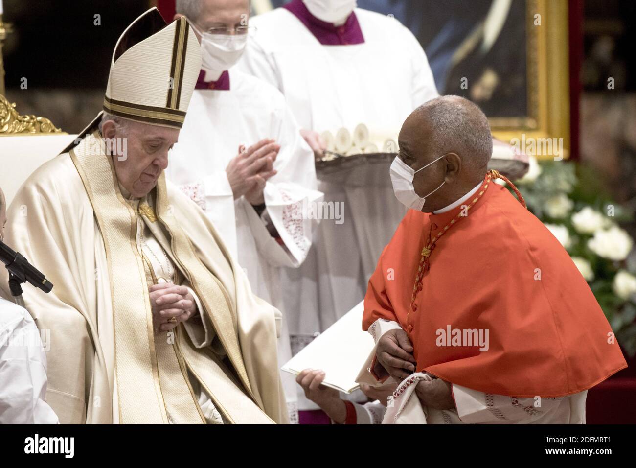 New Cardinal Wilton Daniel Gregory (USA) receives the red biretta hat ...
