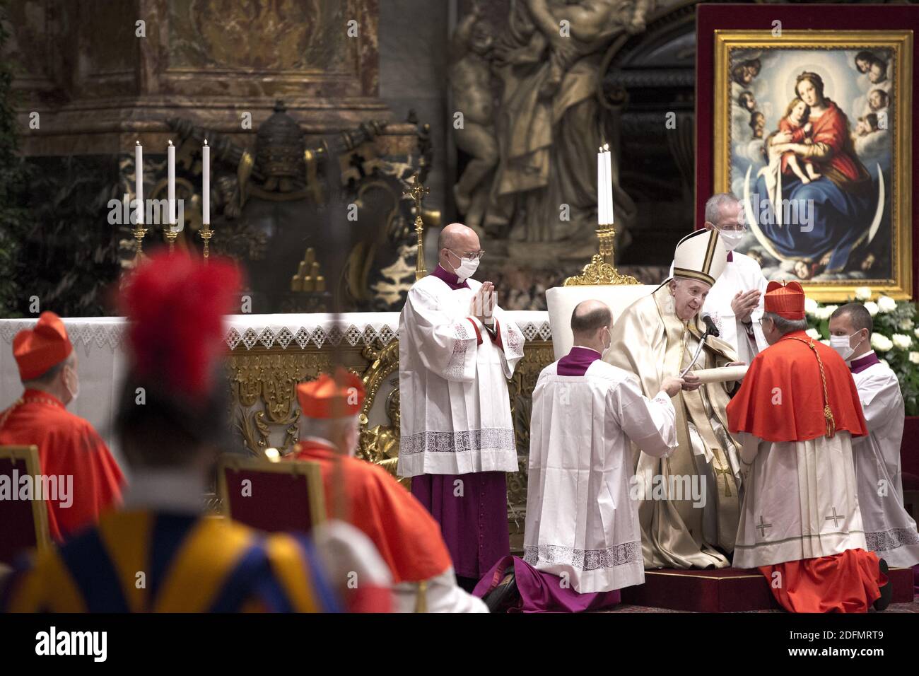 New Cardinal Enrico Feroci (Italy) receives the red biretta hat from ...