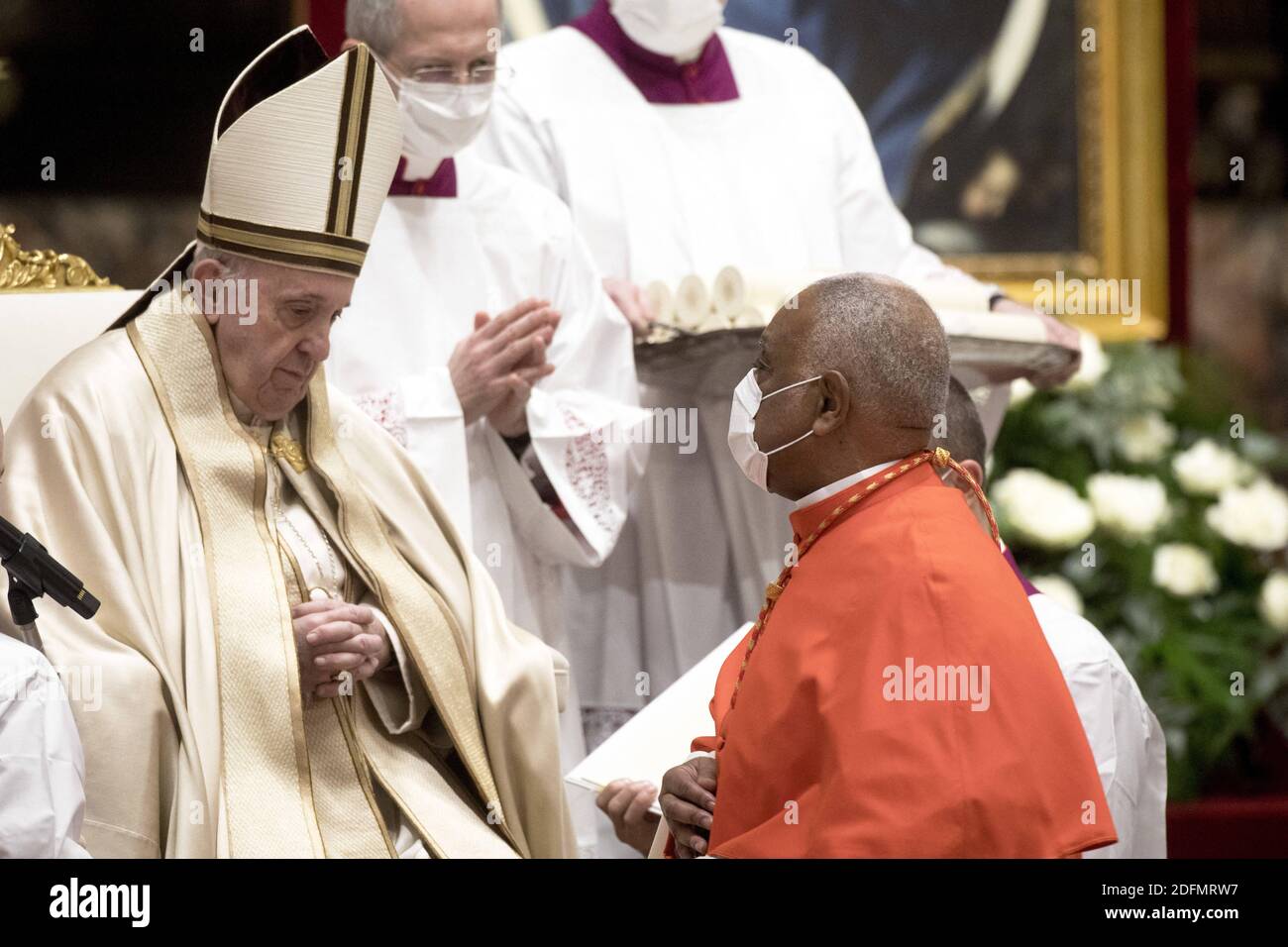 New Cardinal Wilton Daniel Gregory (USA) receives the red biretta hat ...