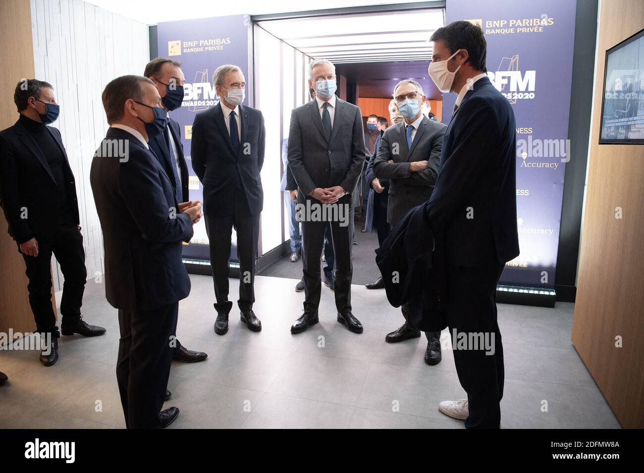 Chairman of LVMH, Bernard Arnault, Alain Weill, Chairman and CEO of ...