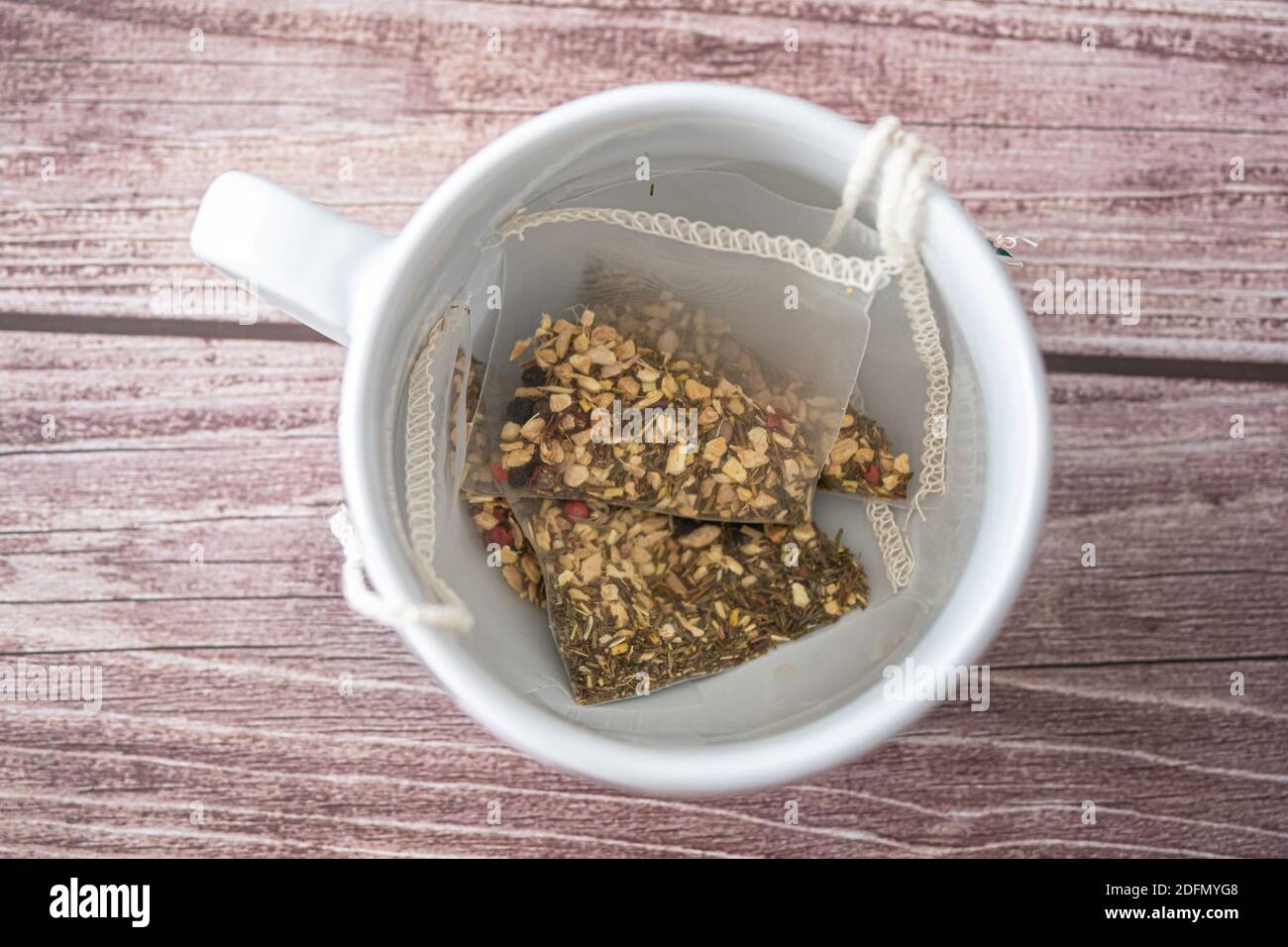 Herbal Tea bags in tea cup to prepare a cup of tea Stock Photo - Alamy