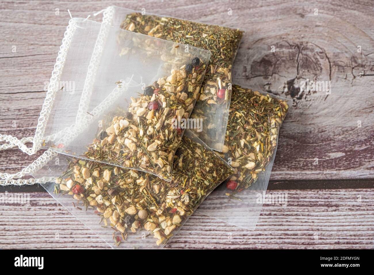 herbal tea bags on wood table surface Stock Photo - Alamy