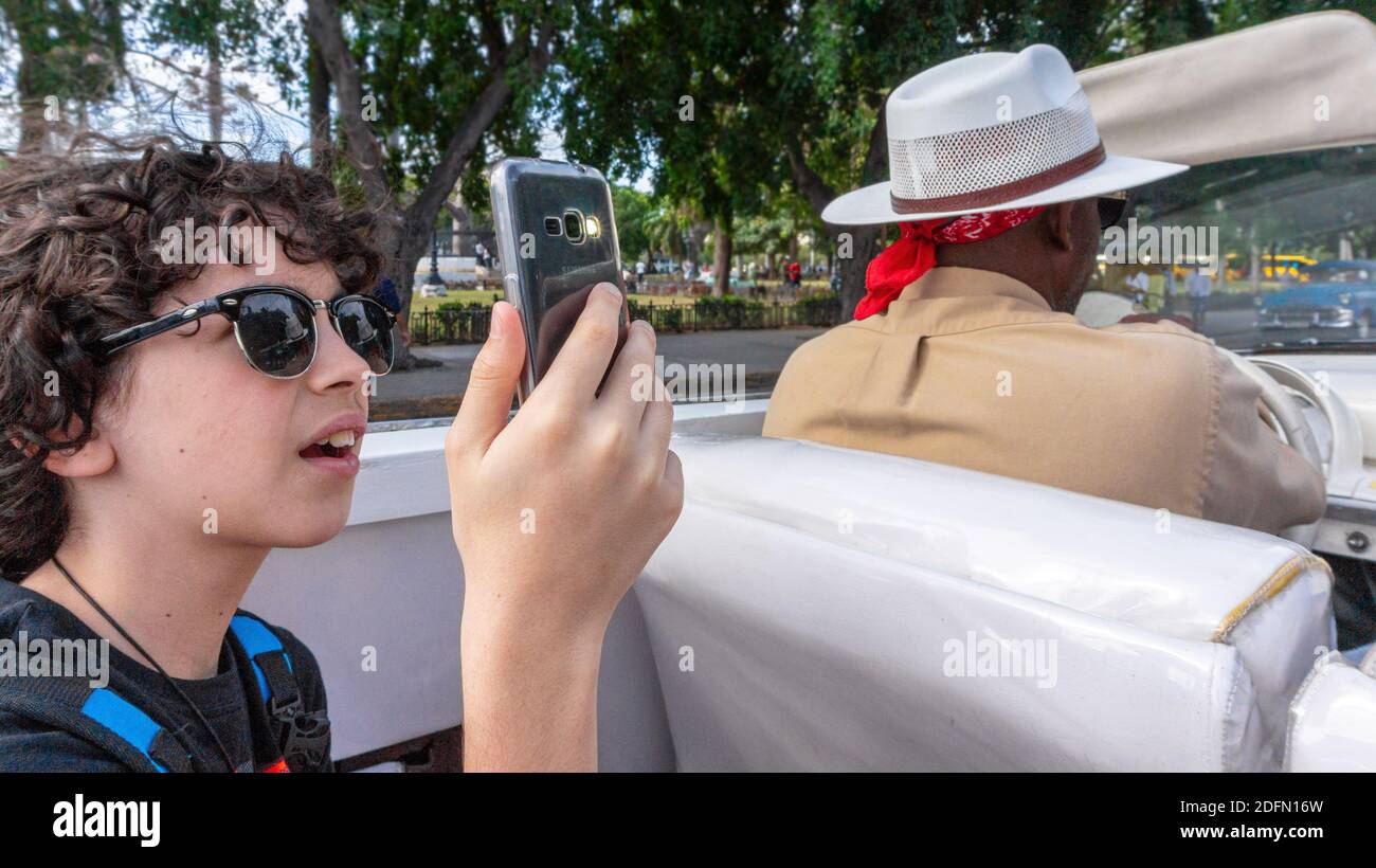 Child boy in old car, Havana, Cuba Stock Photo - Alamy