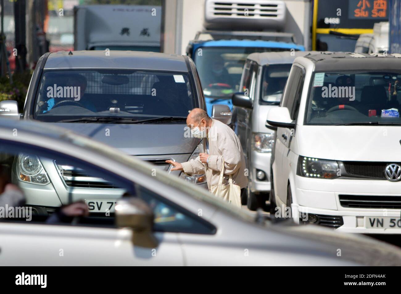 Elderly pedestrian crossing the road hi-res stock photography and ...