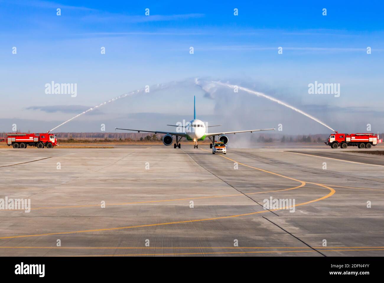 Water salute by fire truck at the airport for first visit passenger ...